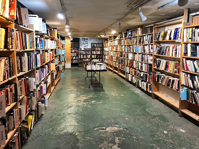 Endless rows of literary delights await! This bookstore's interior is a labyrinth of knowledge, where getting lost is half the fun.