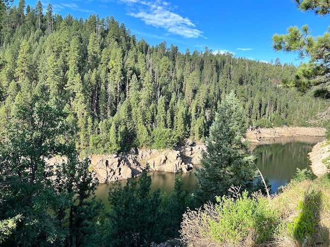 Mother Nature's masterpiece on full display. If Bob Ross painted reservoirs, this would be his "happy little water."