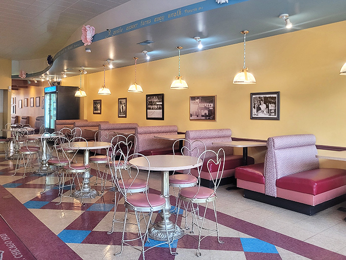 Retro chic meets comfort in this diner dreamscape. The heart-shaped chairs whisper, "Stay awhile, calories don't count here!"