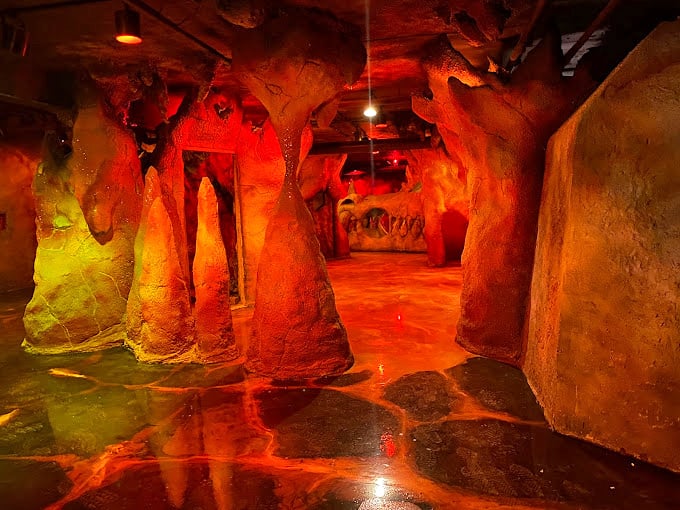 Dante's Inferno meets Disneyland in this fiery corridor. The main hall's crimson glow and rocky formations set the stage for magical quests ahead.