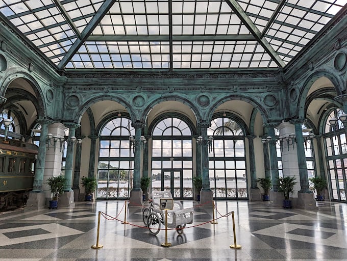 Grand Central Station meets ballroom chic. I half expect to see Fred Astaire gliding across that checkered floor.