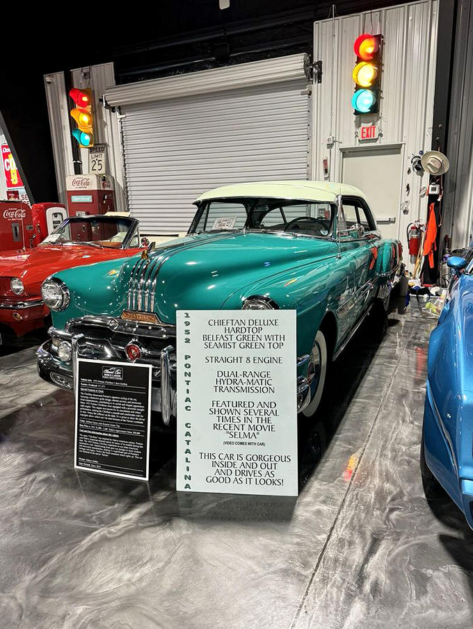 Behold the 1955 Pontiac Chieftain, a Belfast Green beauty that's more dressed up than a movie star on Oscar night. This rolling time capsule is ready for its close-up!