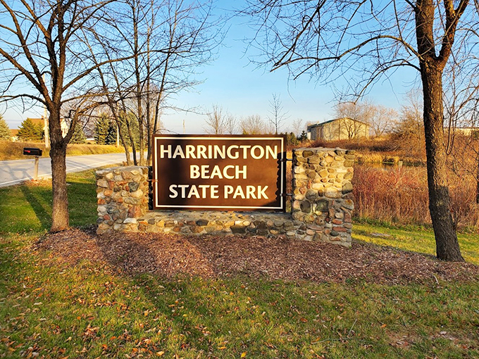 The rustic sign welcomes visitors to a world where nature reigns and stress takes a back seat.