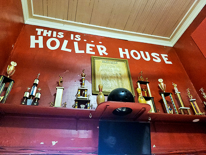 Trophy hunters, beware! This shelf's worth of hardware might just inspire you to dust off those bowling shoes and aim for glory.