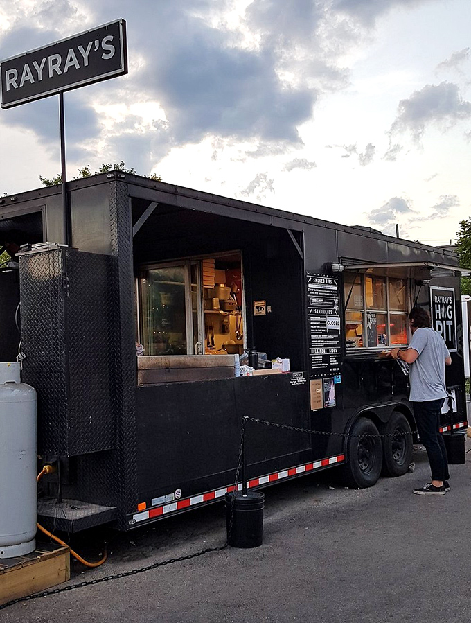 Step right up to flavor town! This unassuming window is where barbecue dreams come true, one mouthwatering order at a time.