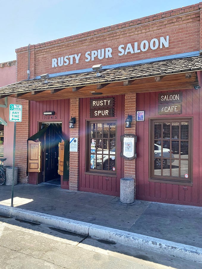 Swinging doors and neon signs&mdash;a time machine disguised as a saloon entrance. John Wayne would feel right at home sidling up to these weathered planks.