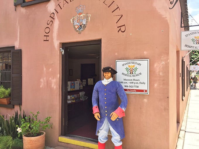 "Honey, I shrunk the doctor!" This pint-sized greeter might not perform surgery, but he sure knows how to welcome visitors with colonial style.