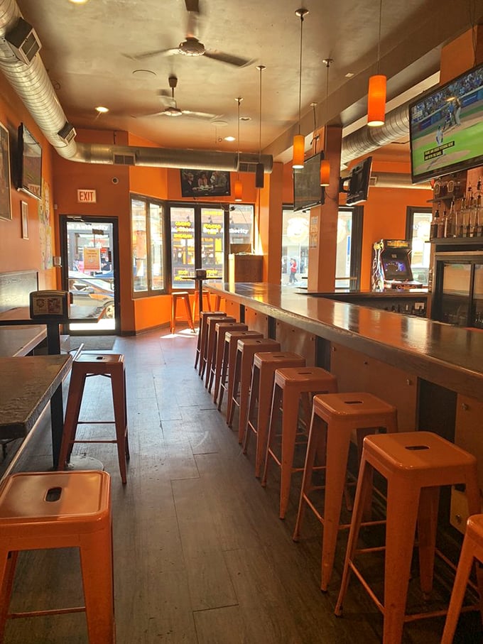Step into a world where orange is the new awesome. Cheesie's interior is a perfect blend of cozy pub and retro diner vibes.