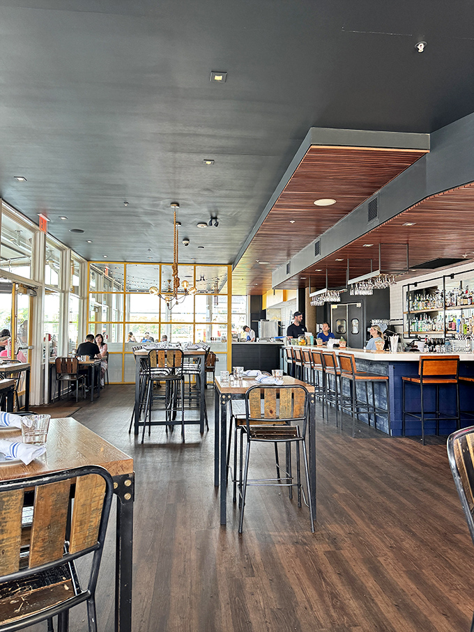 Step inside and let the nautical charm wash over you. This isn't just a dining room; it's a portal to coastal bliss, where every table feels like the captain's quarters.