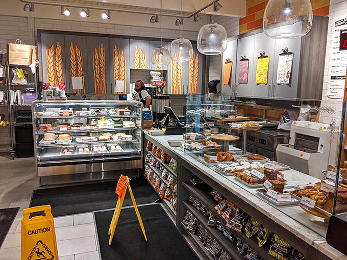 Step into a baker's paradise! The display cases are a treasure trove of temptation, making choosing just one treat harder than resisting a warm cookie.
