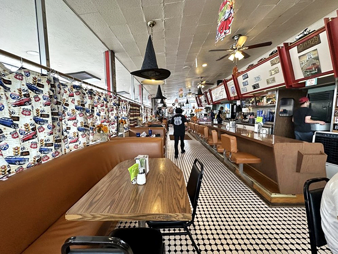 Step inside and travel through time! The checkered floor and vintage decor transport you to an era when sock hops and jukeboxes ruled supreme.