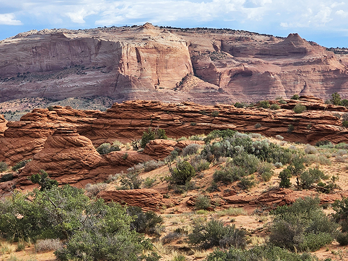 Talk about a room with a view! This panorama of layered cliffs and scrubby desert could make even the most jaded traveler feel like they've stumbled onto the set of a sci-fi epic.