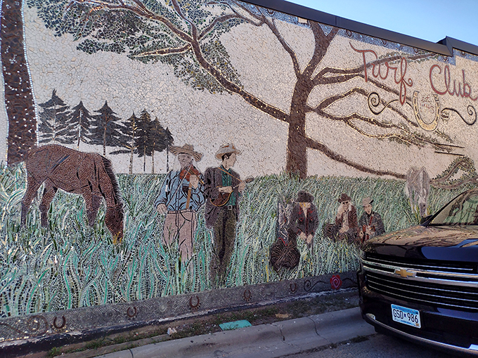 A mural that sings! This artistic ode to the Turf Club's roots blends pastoral scenes with musical magic, creating a visual melody on the building's side.