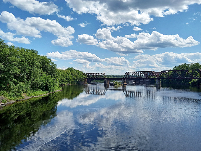 Mirror, mirror on the river: The Kennebec reflects the sky, creating a scene so picturesque it's like Maine's own Rorschach test.