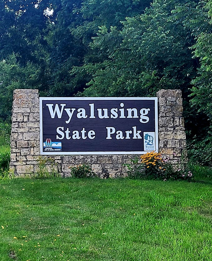 "Wyalusing" your chance for adventure if you don't stop here. This sign marks the gateway to natural wonders.