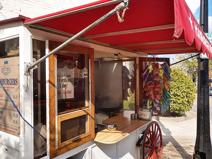 Peek behind the curtain of burger wizardry! This compact kitchen on wheels proves that sometimes, the best things come in small, sizzling packages.