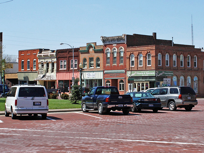 Main Street magic! These colorful storefronts aren't just pretty faces &ndash; they're the beating heart of Carlinville, each with stories as rich as grandma's secret recipe.