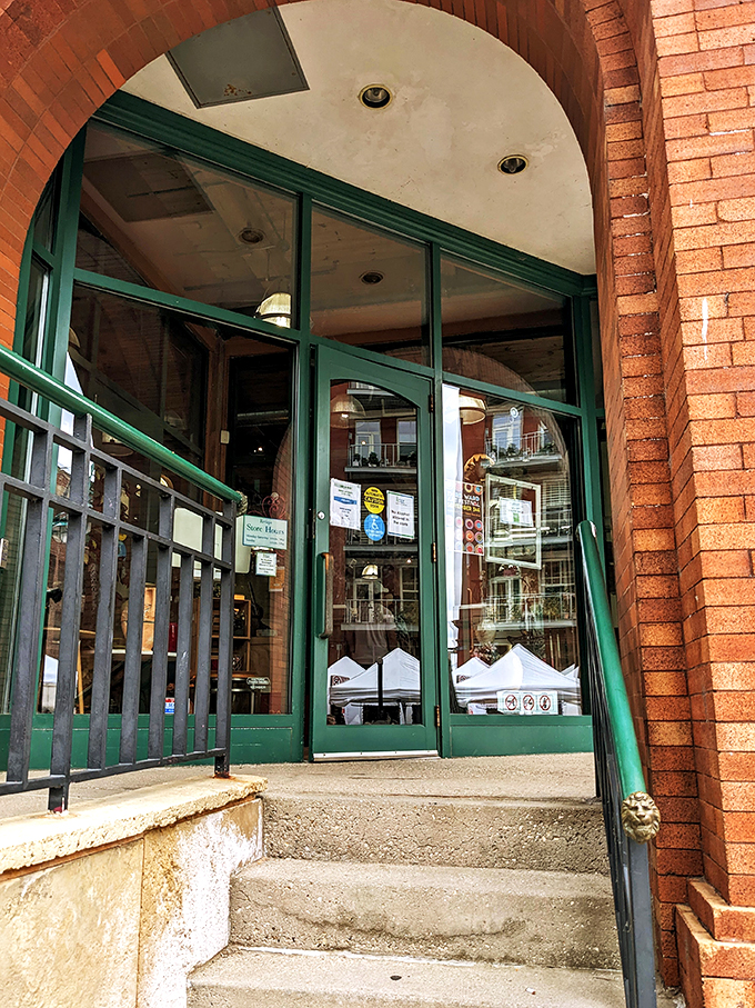 Step right up to the gateway of style salvation! This arched entrance isn't just a door; it's a portal to a world of fashion treasures waiting to be discovered.