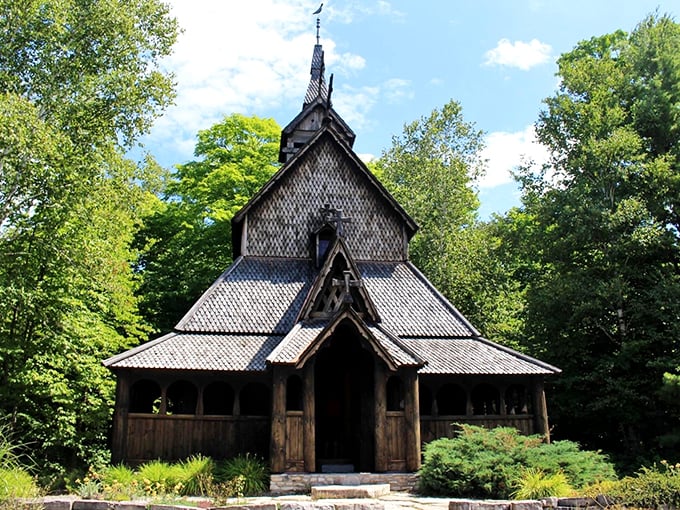 Step right up to Valhalla's front porch! The intricate woodwork and steep roof make you wonder if Thor himself might pop out for a chat.