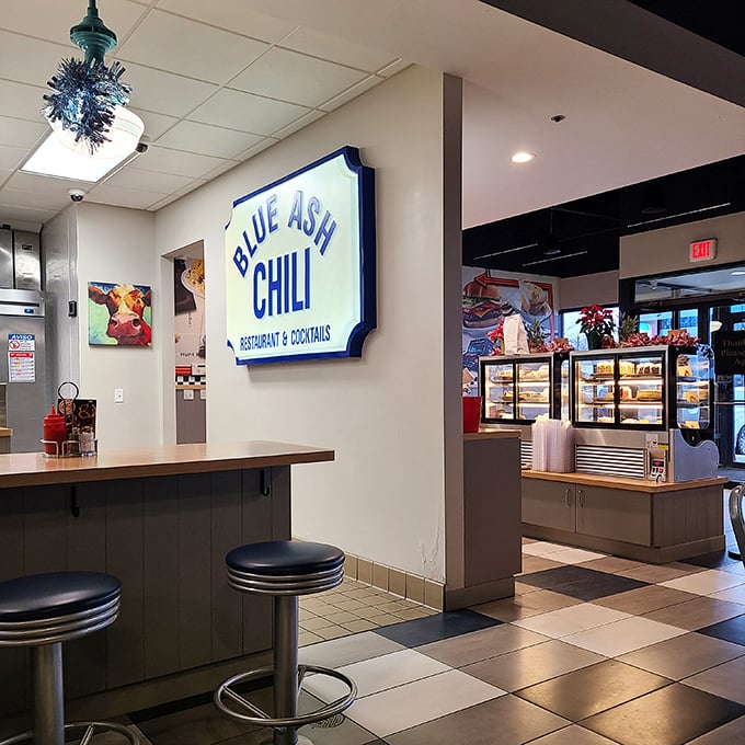 Step inside and feel the buzz of anticipation. The retro-chic interior is where comfort food dreams come true, and diet plans go to die &ndash; deliciously.