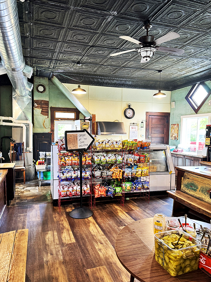 Step inside and let the tin ceiling whisper tales of burgers past. It's like grandma's kitchen got a hipster makeover!