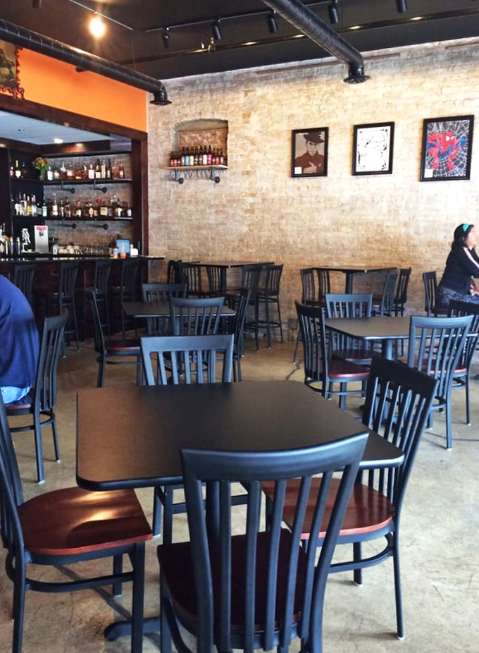 Step into a cozy realm where exposed brick meets pop art, and every table tells a delicious story.