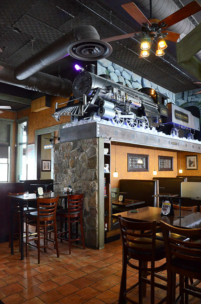 Choo-choo choose your seat! This dining car comes with a side of nostalgia and a main course of mouthwatering pizza.