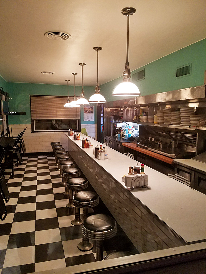 Step into a time machine disguised as a diner. Our Kitchen's retro interior whispers tales of countless satisfied stomachs.