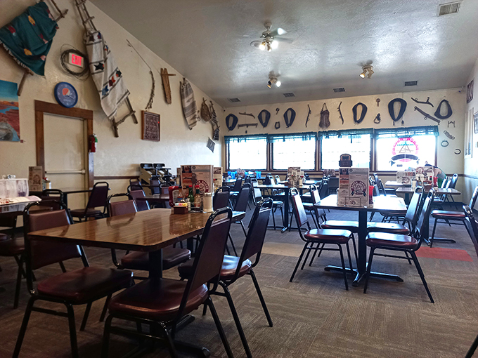 Step into a time machine of taste! This cozy interior is where cowboy chic meets grandma's kitchen, serving up nostalgia with a side of sass.