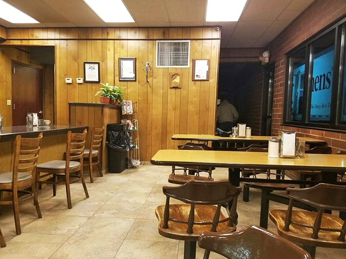 Step into a time machine disguised as a dining room. The wood paneling whispers tales of countless satisfied customers.