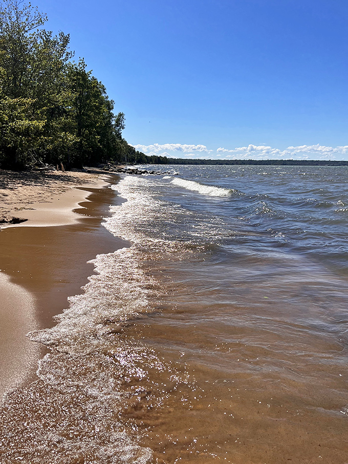 Waves whispering secrets to the shore &ndash; Lake Superior's version of a beachside gossip session. Tune in for the latest splash!