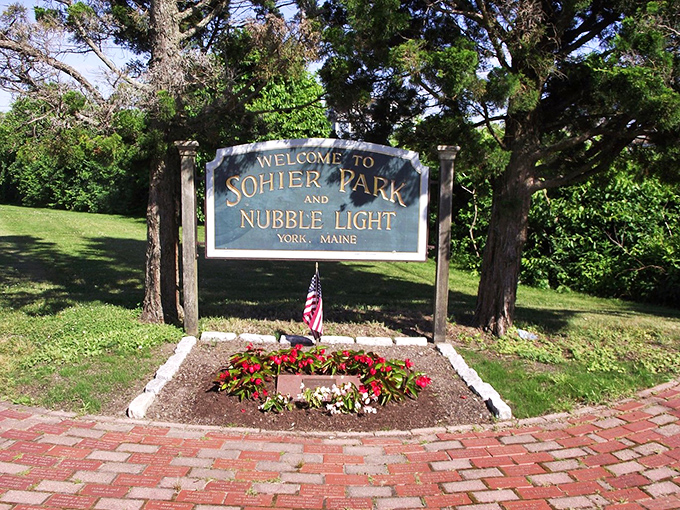 Welcome to paradise, Maine-style! This sign isn't just an invitation; it's a promise of coastal magic and lighthouse love.