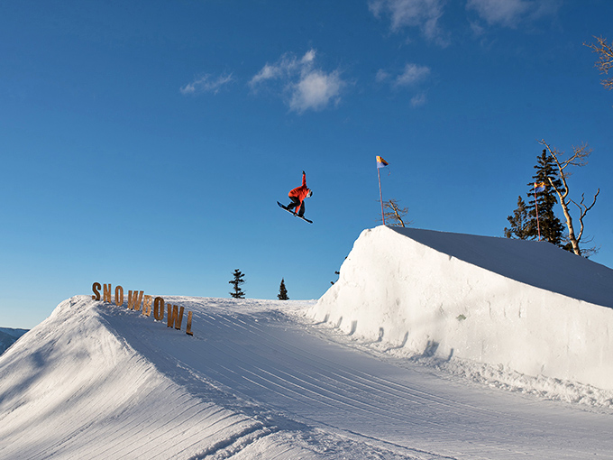 Catching air and defying gravity! This snowboarder's mid-flight acrobatics would make even Tony Hawk jealous. Talk about taking "desert air" to a whole new level!