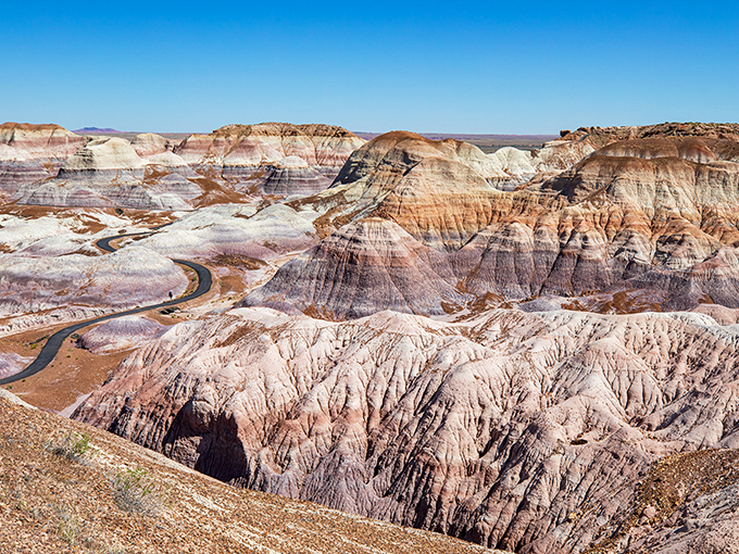Talk about a bird's eye view! This winding road through the badlands looks like God's own marble run. Bet the GPS goes bonkers here.