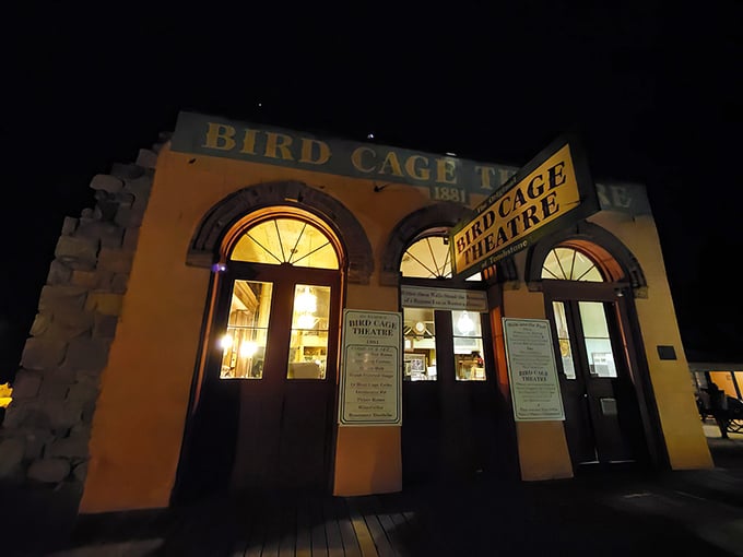 Step right up! The Bird Cage Theatre's facade promises a night of Wild West entertainment.