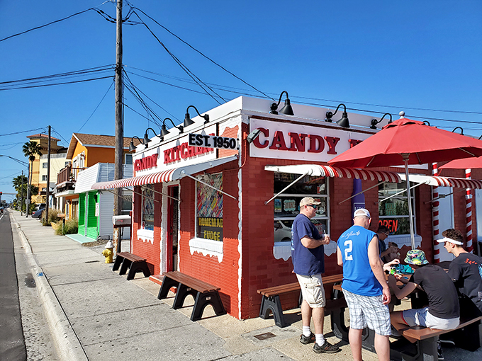Ahoy, sweet tooths! This little red candy shack is a treasure trove of sugary delights by the sea.