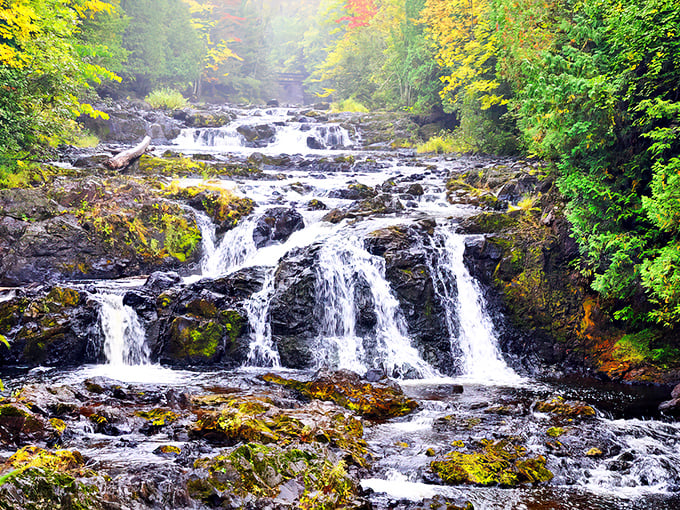 Copper Falls: Double trouble! These twin cascades put on a show that would make Niagara blush. It's nature's own rusty-hued water park.