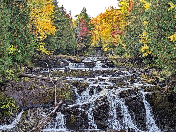 Those autumn colors reflecting off the cascade prove that Copper Falls knows how to put on a show for leaf-peeping season.