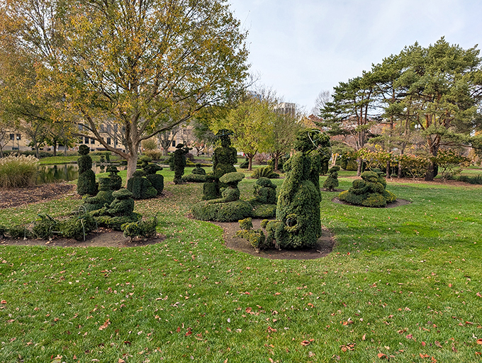 Green sculptures come alive! It's like Edward Scissorhands went on a artistic rampage &ndash; in the best way possible.