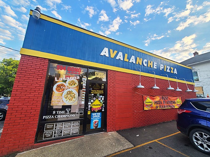 Forget climbing Everest. Conquering an Avalanche pizza is the real adventure here!