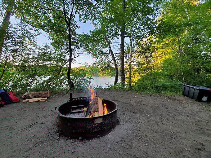 Nature's own mood lighting. As day fades to dusk, this lakeside fire pit becomes the coziest spot in the Northeast Kingdom.