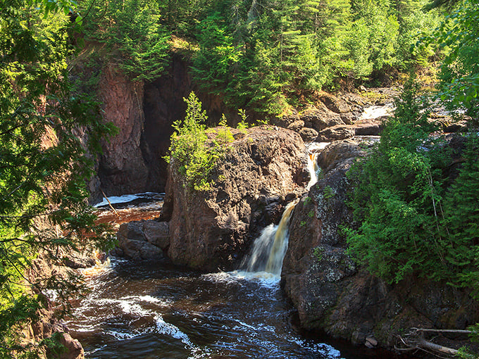 Copper Falls: Where the water does the heavy metal headbanging! These reddish-brown cascades are like Mother Nature's own rust-colored paintbrush at work.