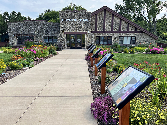 Roadside attraction or secret gnome village? Crystal Cave's charming visitor center sets the stage for underground wonders.