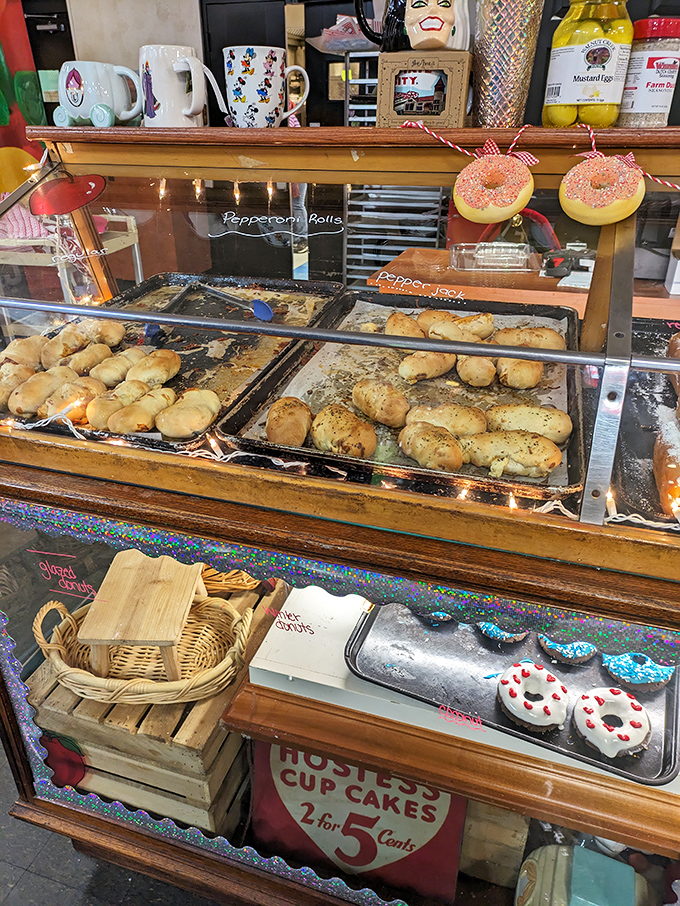 Behold, the glass case of temptation! These pepperoni rolls are doing the cha-cha, trying to dance their way into your shopping bag.