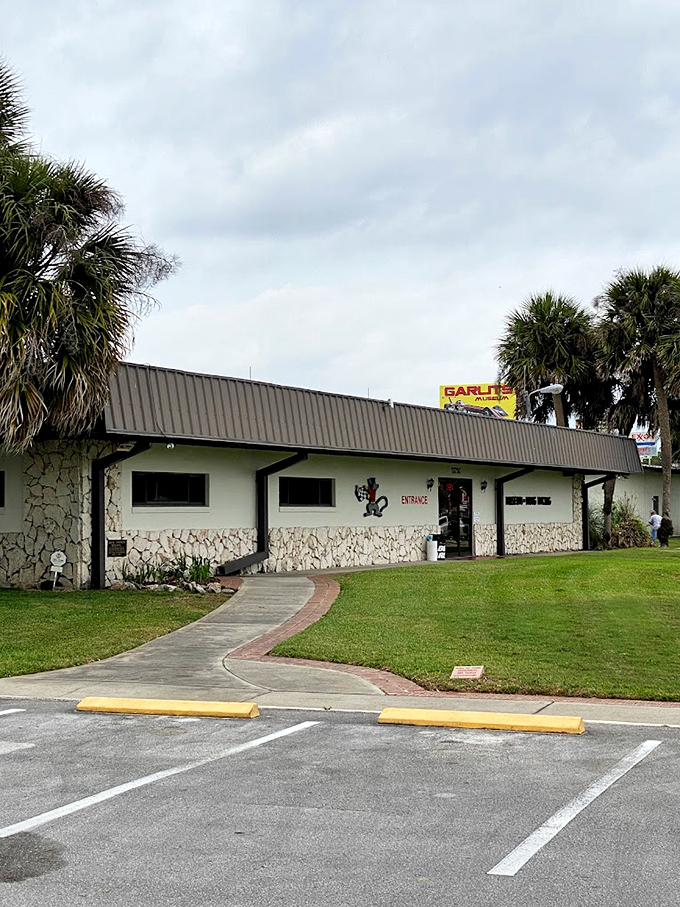 Gentlemen (and ladies), start your engines! This entrance is your gateway to a world where speed is king and chrome is the crown jewel.