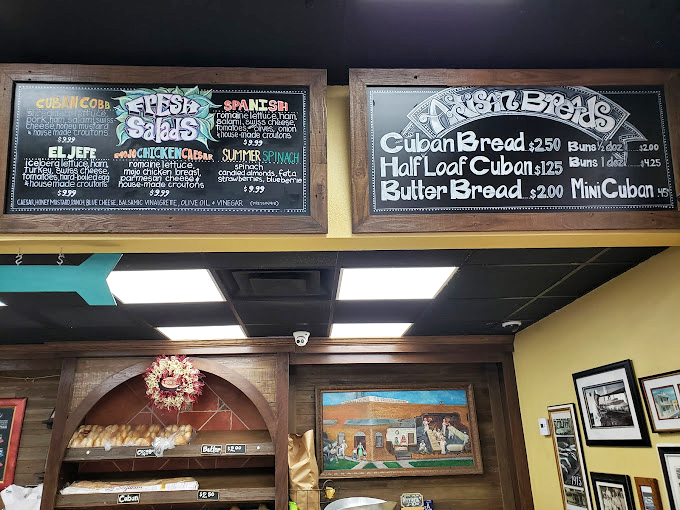 Decisions, decisions! This menu board is like a culinary choose-your-own-adventure novel, where every choice leads to deliciousness. Pro tip: close your eyes and point – you can't go wrong!