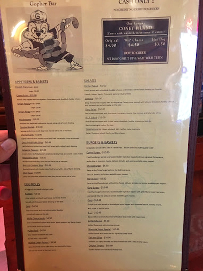 Decisions, decisions! This menu's like a roadmap to flavor town, with the Coney Island dogs stealing the spotlight. Cash only, folks &ndash; old school cool.