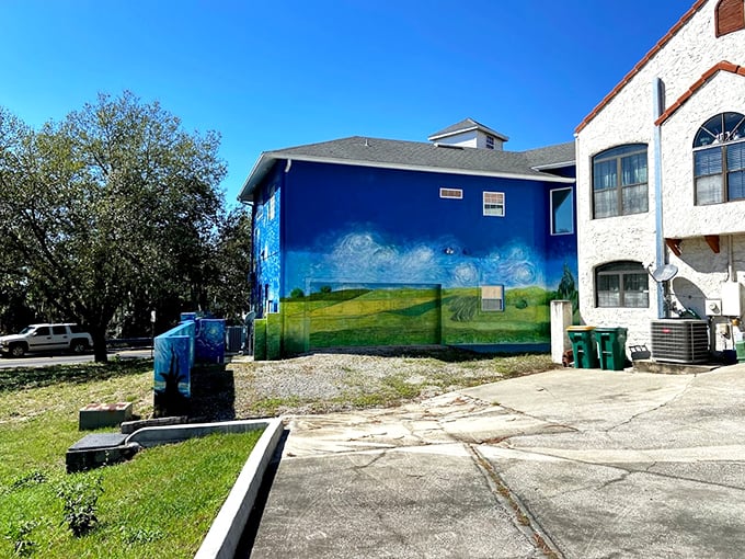 Fields of gold meet waves of blue in this mesmerizing mural. It's like Mother Nature and Van Gogh had a paintbrush duel!
