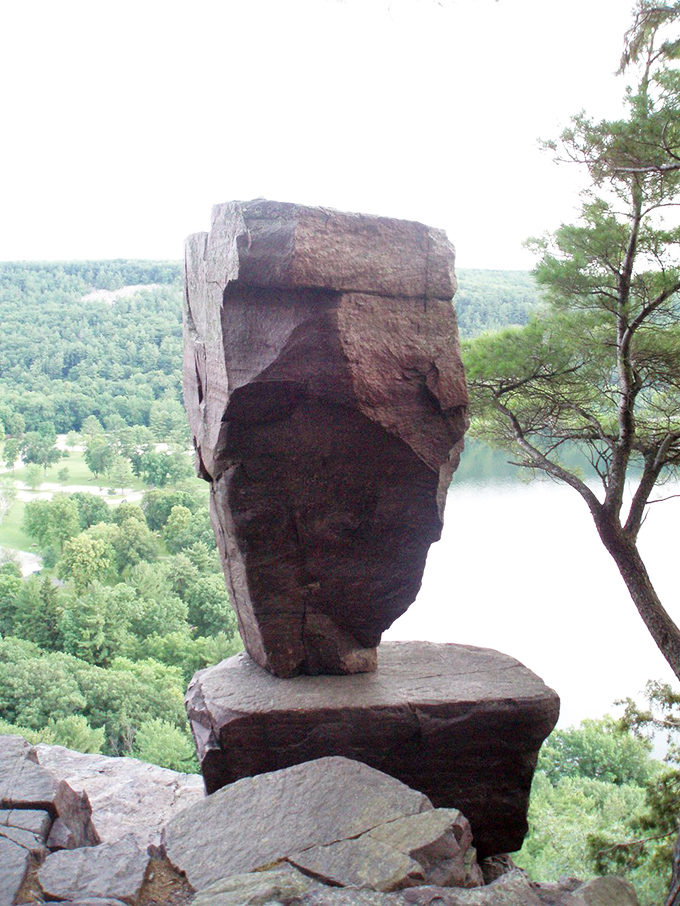 Nature's Jenga game gone wild! This precariously balanced rock formation will have you holding your breath and your camera steady.