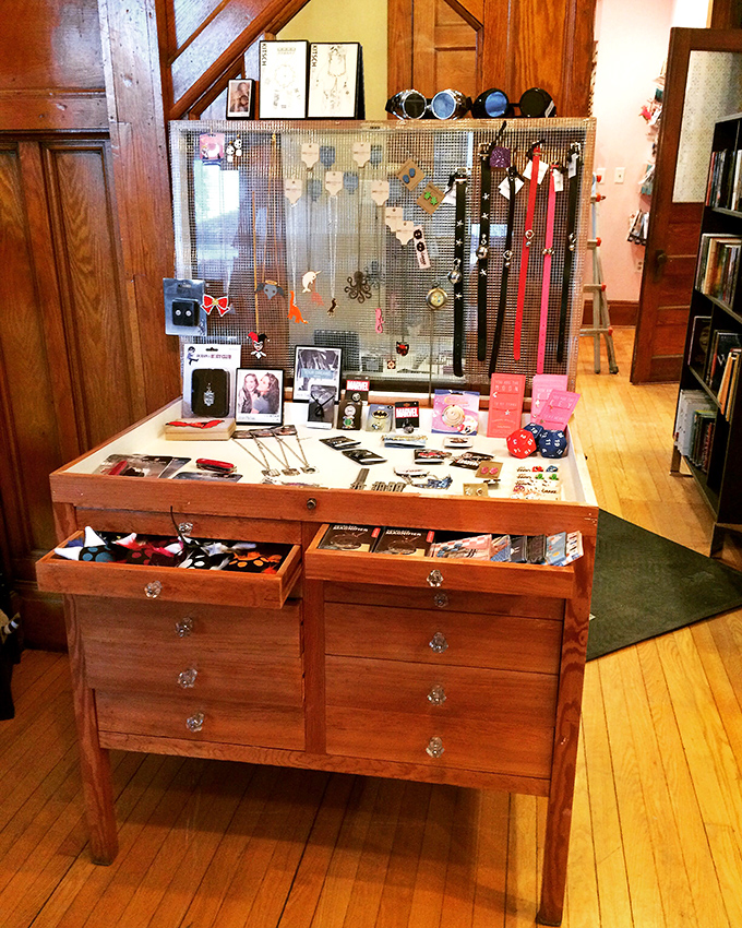 Trinket heaven or organized chaos? This display is a treasure trove of quirky keepsakes that would make even Marie Kondo's head spin with joy.